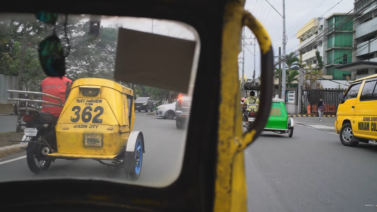 Philippines, tricycle ride from FEU hospital to Fairview Center Mall ...