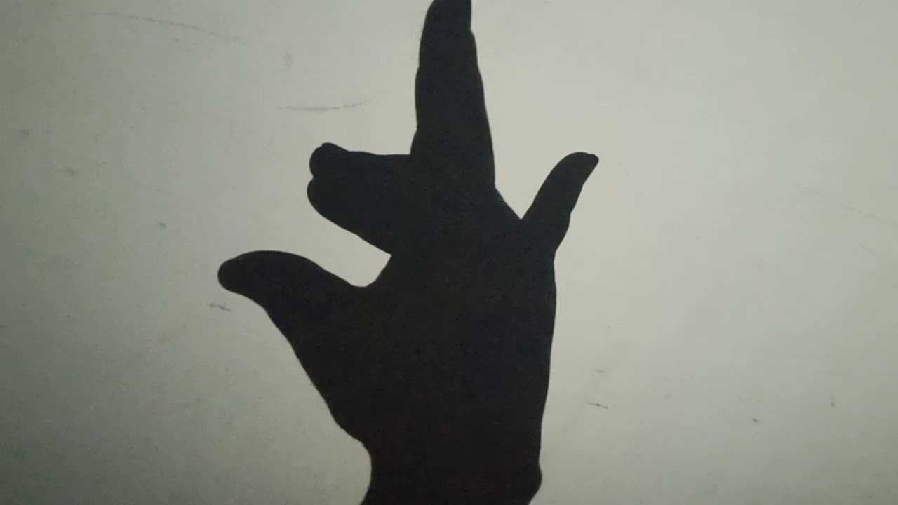 Hand-shadow of dog vintage dancing - YouTube