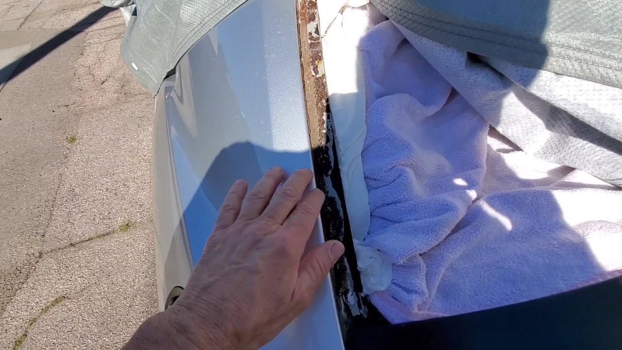 Fixing rust around rear whindshield frame and repainting rear upper ...