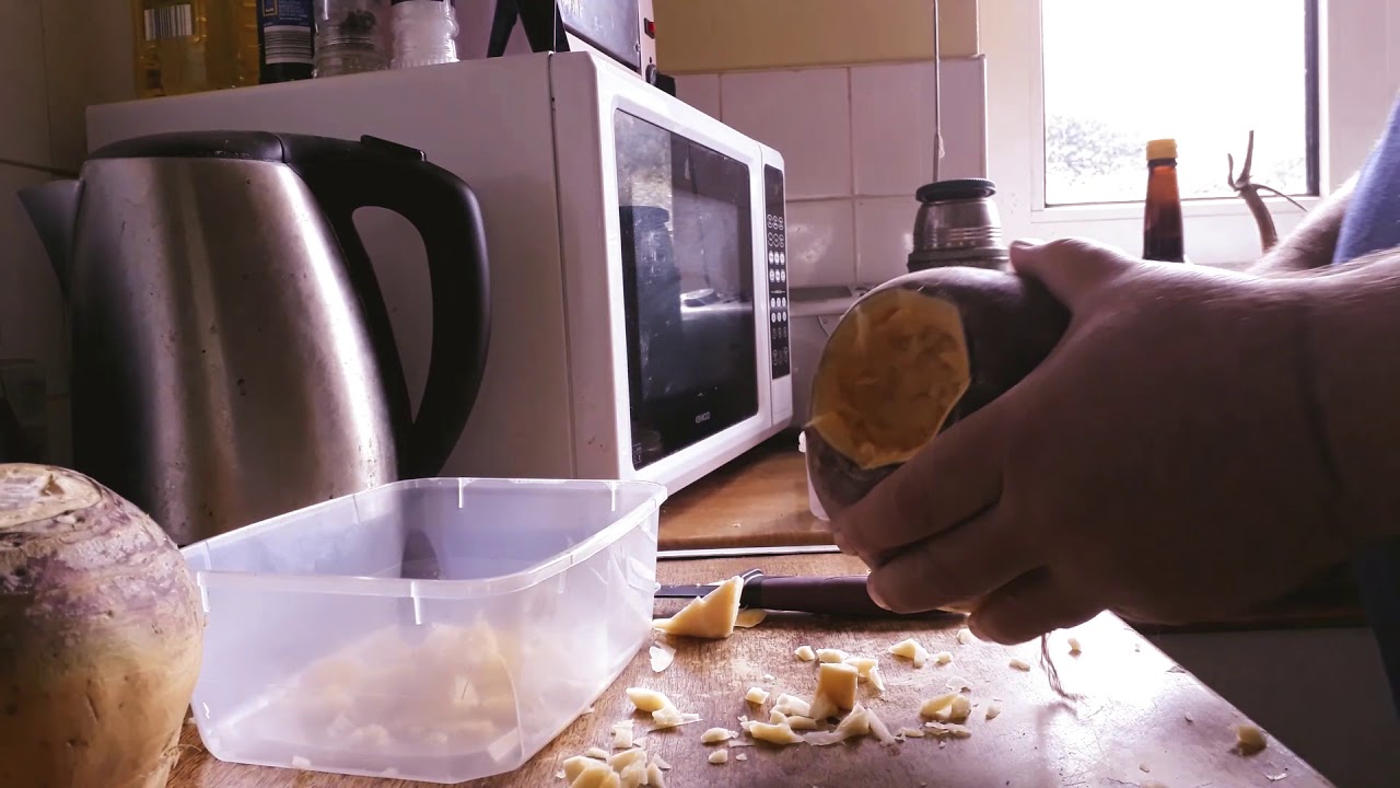 Making a Halloween lantern the traditional way with a swede - YouTube