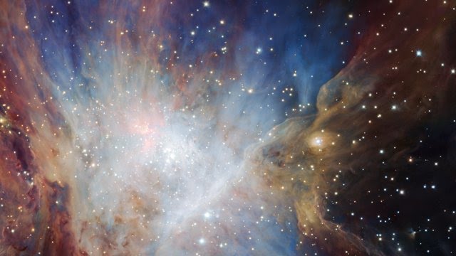 Panning across a deep infrared image of the Orion Nebula - YouTube