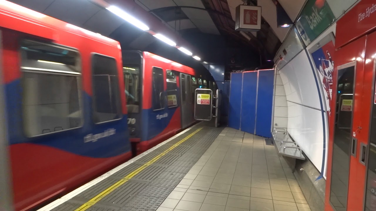 DLR train departing from Bank - YouTube