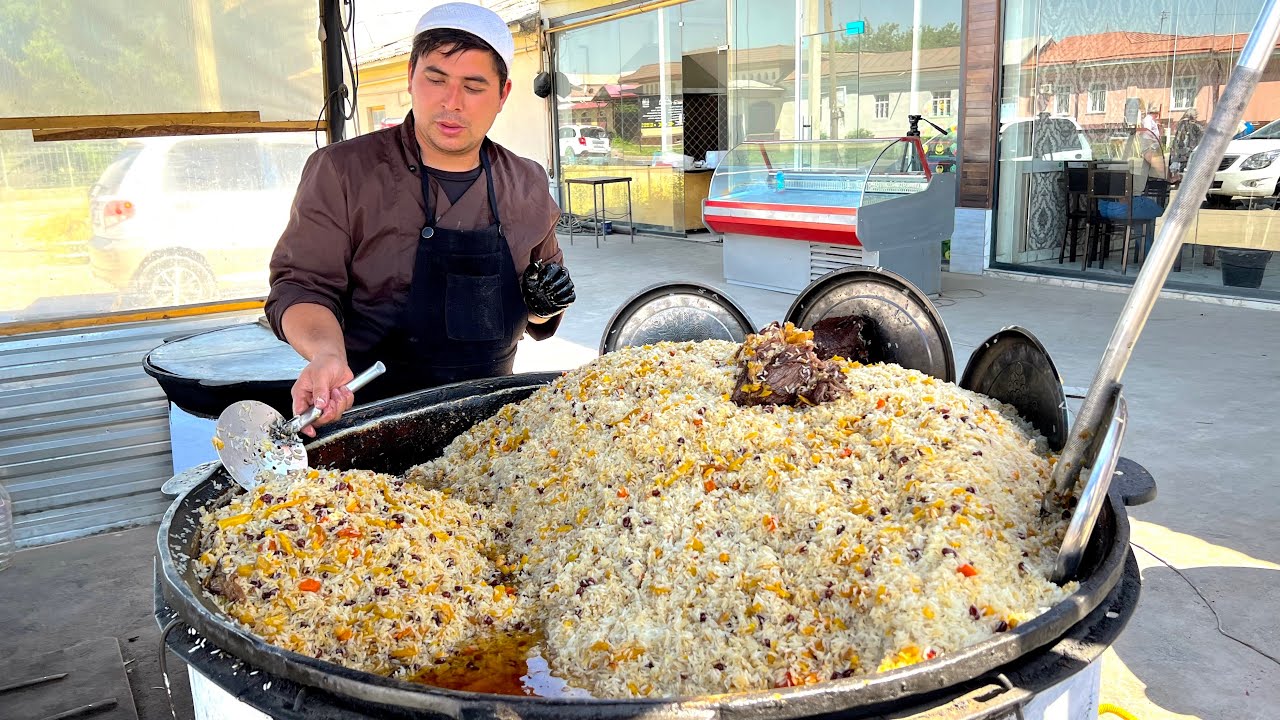 Popular Uzbek pilaf in a large kazan I National Uzbek food - YouTube