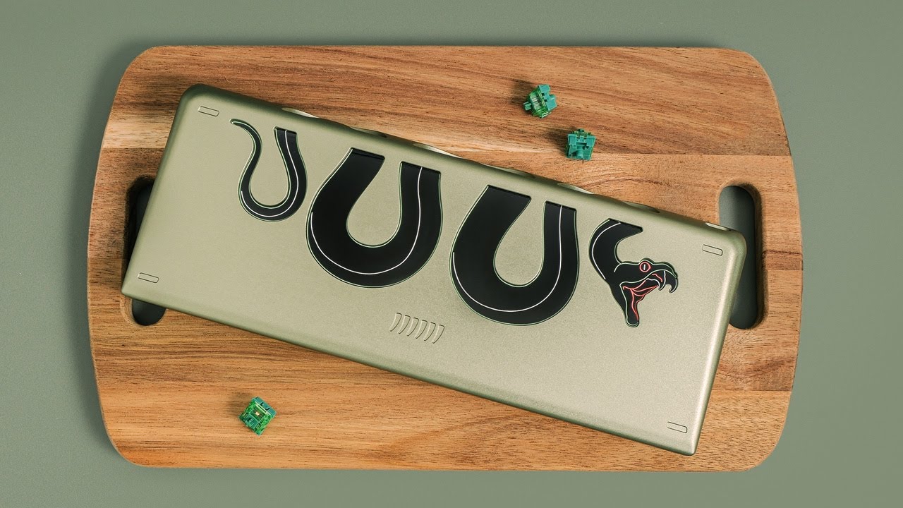 a keyboard with a snake on it - YouTube
