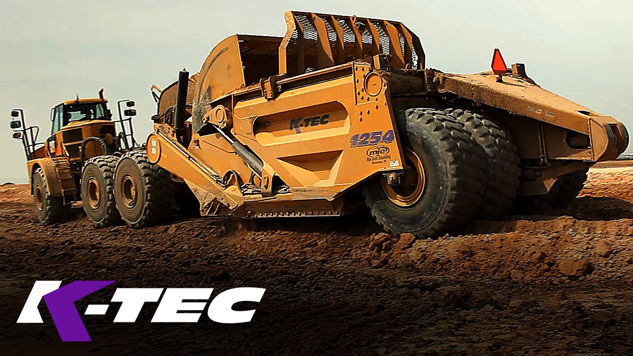 K-Tec 1254 ADT Scraper Unloading - YouTube