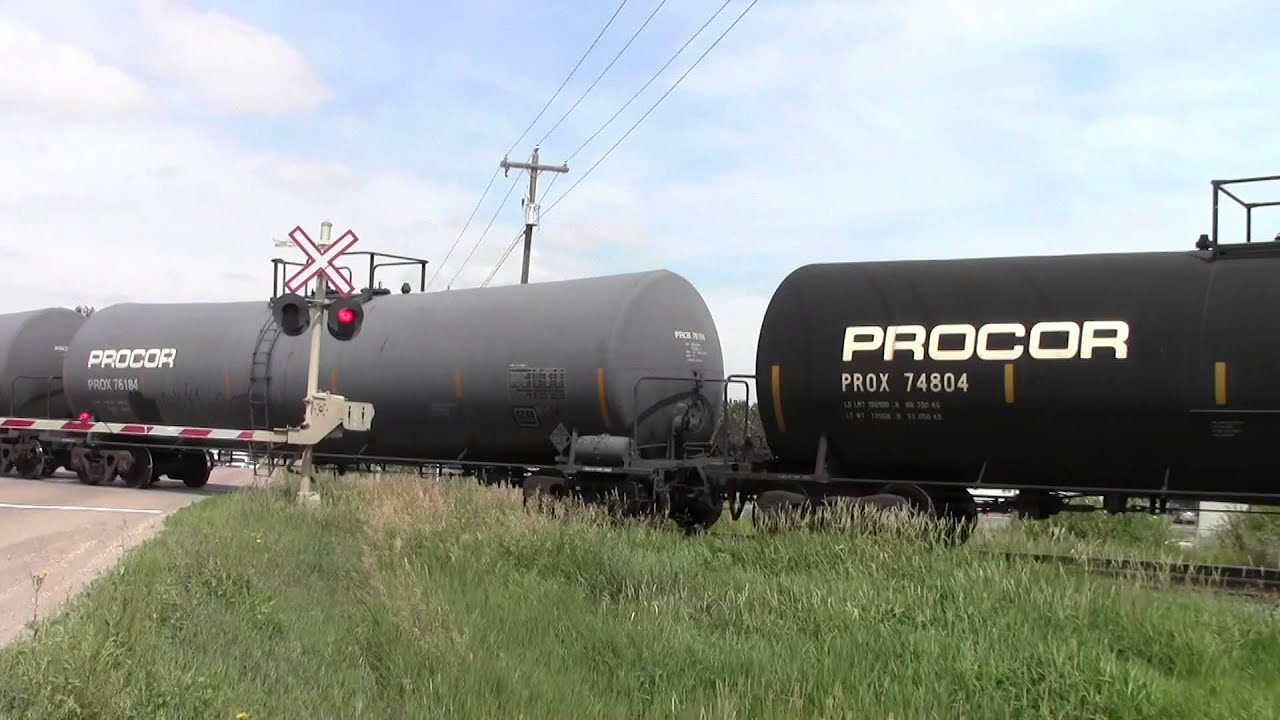RARE! CANDO CCGX 4018 Leads a Oil Train North on the Camrose Sub in ...