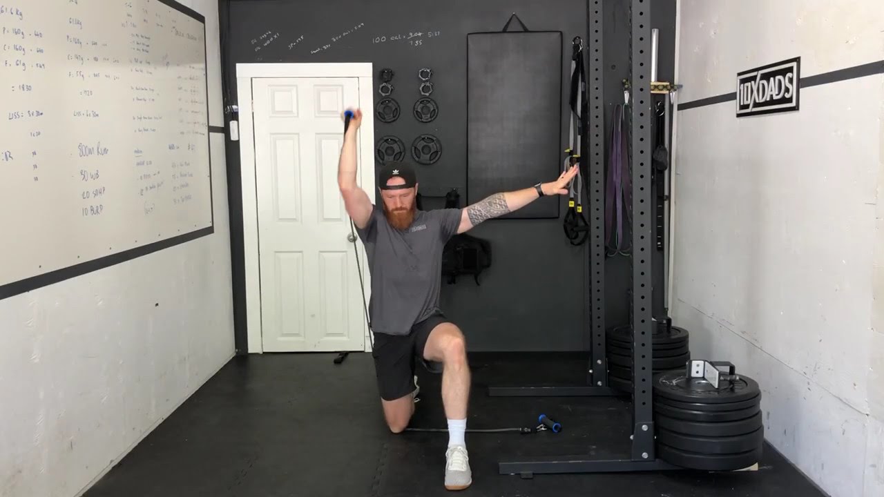 HOW TO PERFORM // (Banded) ½ Knee Single Arm Shoulder Press - YouTube