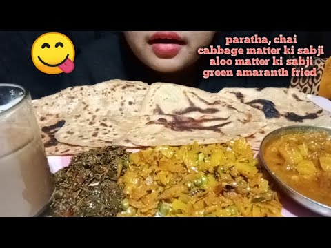 eating paratha, chai, aloo mutter curry, cabbage fry, green amaranth ...
