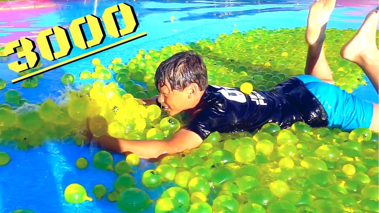 3000 WATERBALLONNEN OP EEN GROOT WATERBED - YouTube