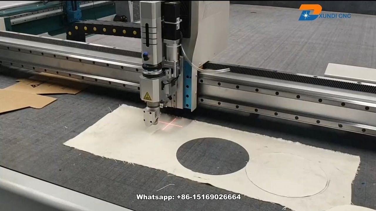CNC vibrating knife cutting machine for fabric cloth - YouTube