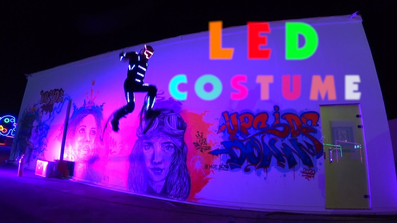 LED Costume + Jumping Stilts / LED-костюм и Джамперы - YouTube