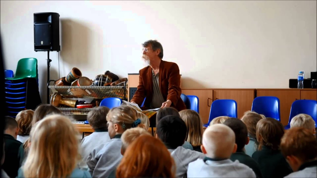 Actor John Hurt reads to the pupils of The Belfry Primary School ...