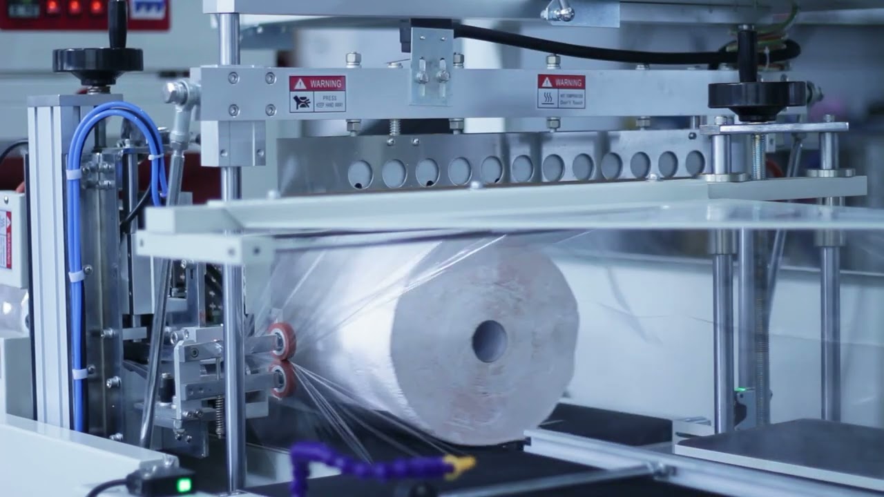 Stable speed labeling maxi roll paper towel heat shrink packing machine ...