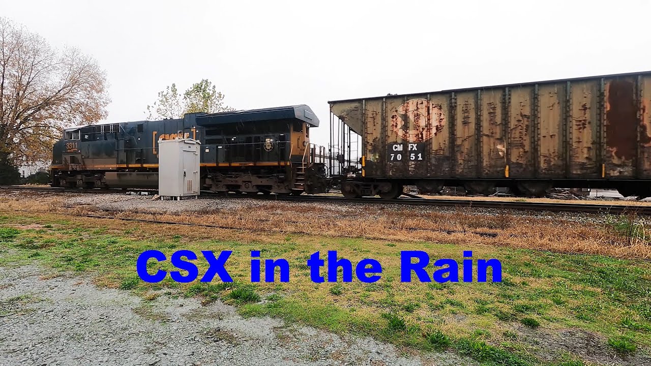 CSX M518-11 in the Rain with 3311 & 3243 - YouTube