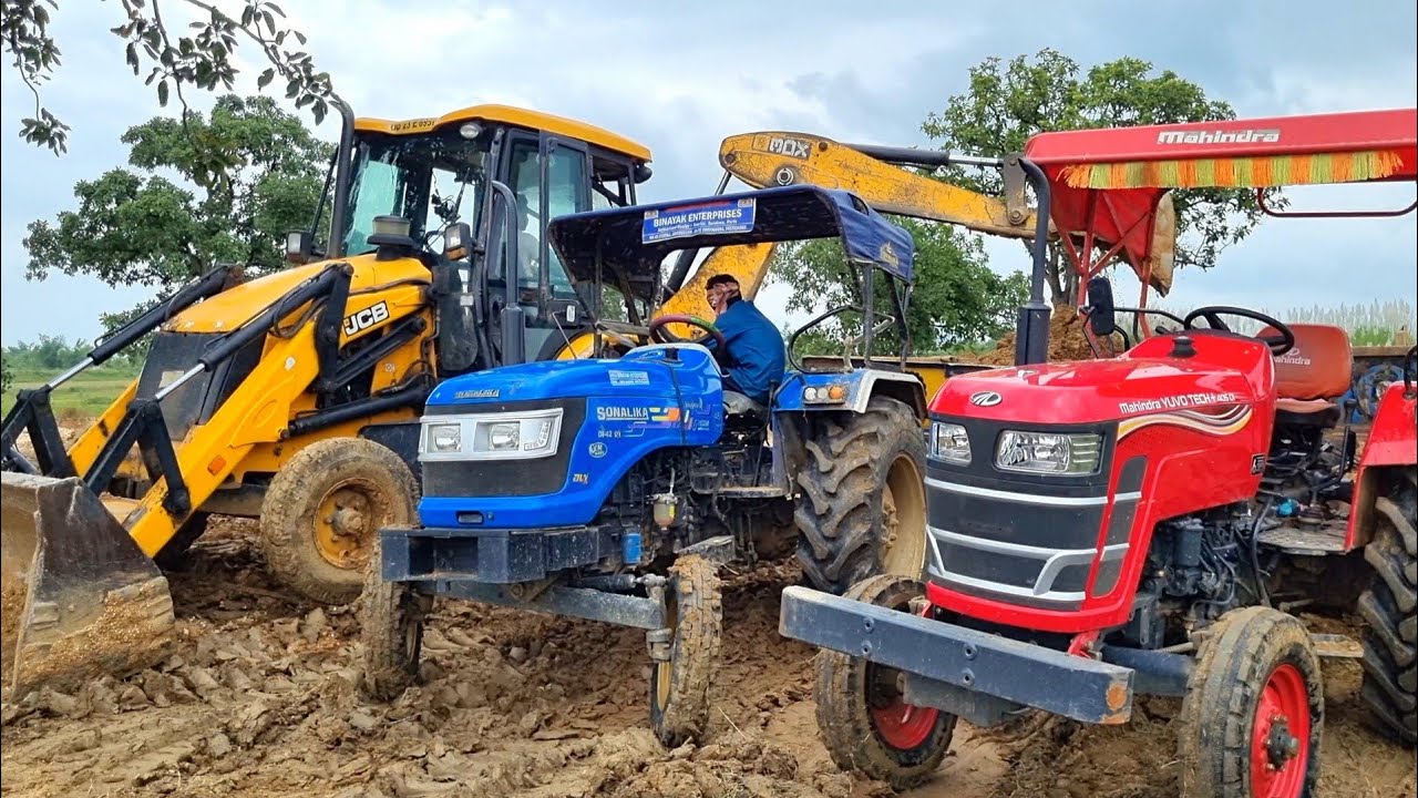 Jcb 3dx Eco Excellence Backhoe Machine Loading Red Mud In Mahindra and ...