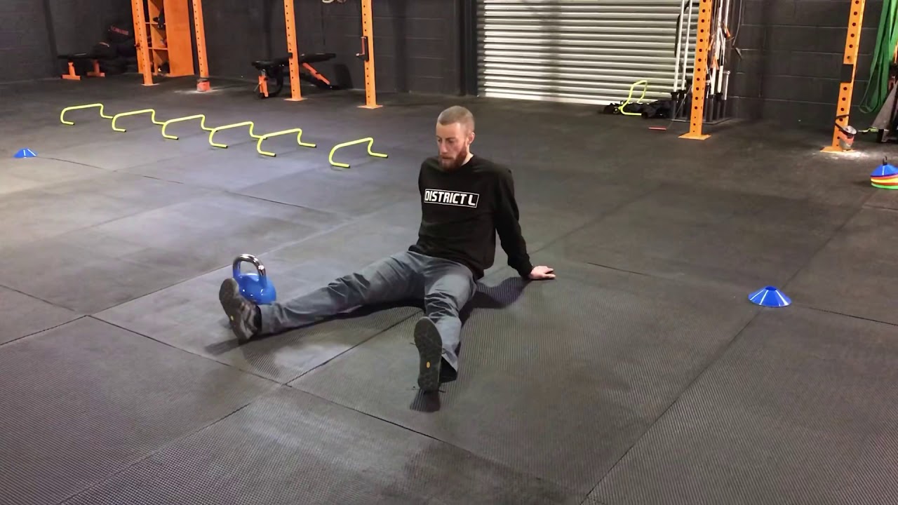 Seated Leg Lift over KB - YouTube