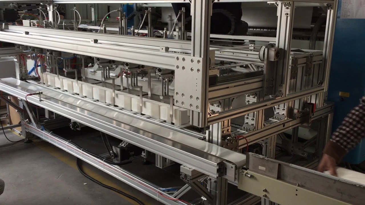 Automatic V fold tissue paper transfer system - YouTube