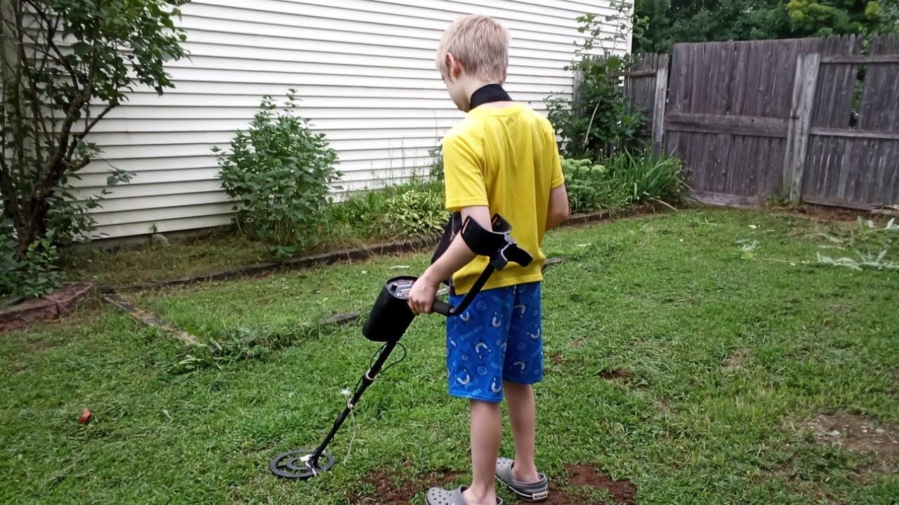Metal detecting, my son found something really cool in our backyard ...