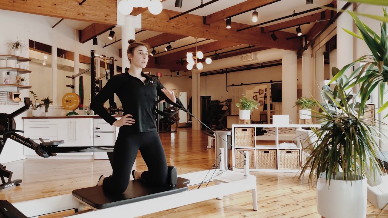 Reformer Kneeling Single Arm Chest Press + Rotations - YouTube