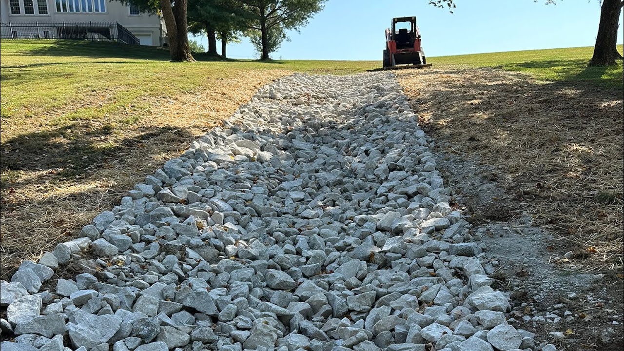 Back on the BIG RIP RAP job. Dump Trailer gets some new rubber $$ - YouTube