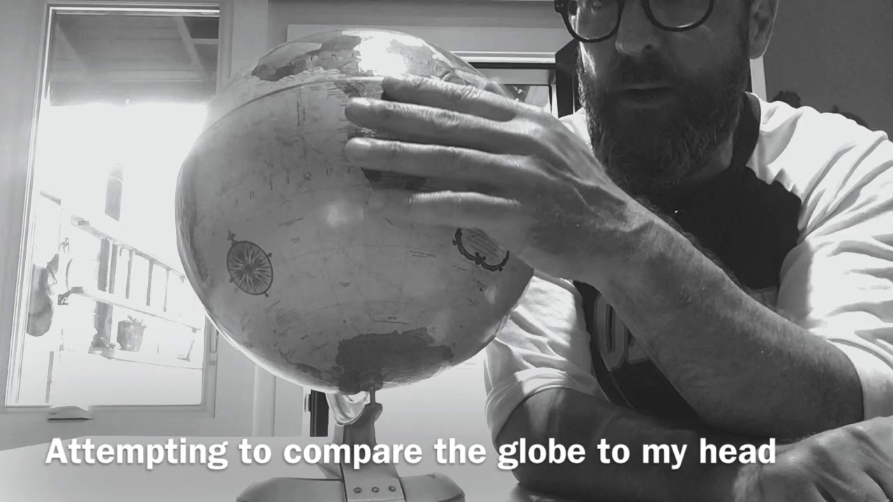 An attempt at comparing a globe and the human head - YouTube