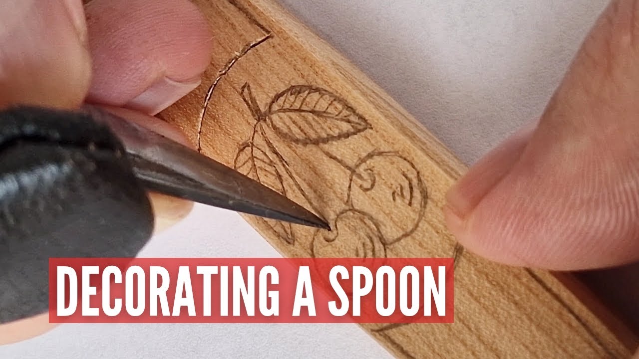 Kolrosing a wooden spoon. Decorating wood with an ancient technique ...