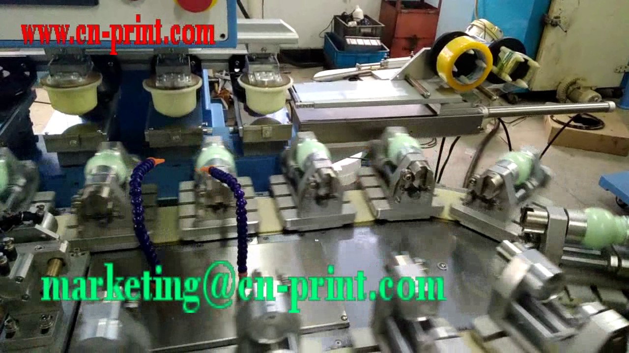 automatic 4 color pad printing machine for bottles - YouTube