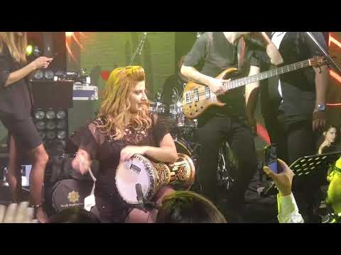 Beautiful girl play Darbuka