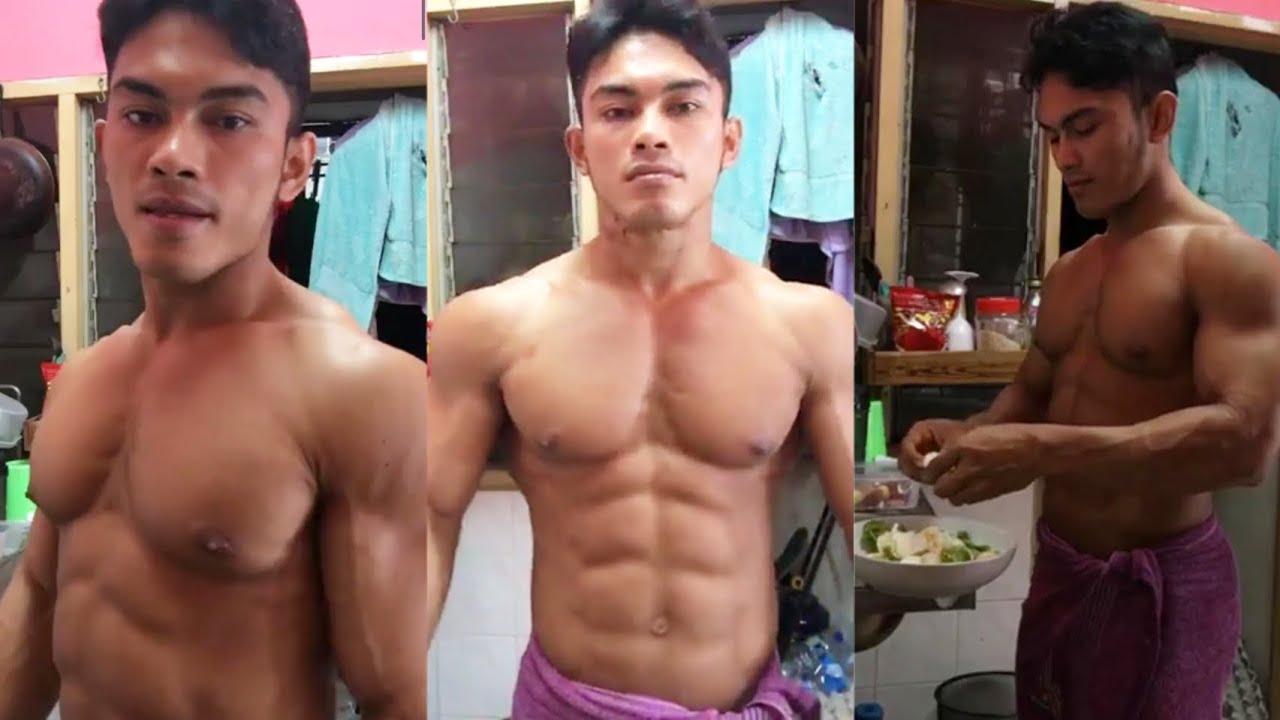 Malaysian bodybuilder cooking while showing off his muscles - YouTube