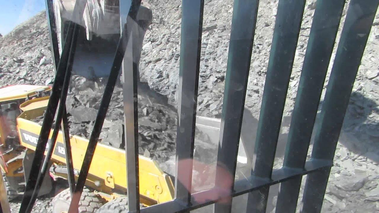 Volvo EC700C loading A25 cab view - YouTube