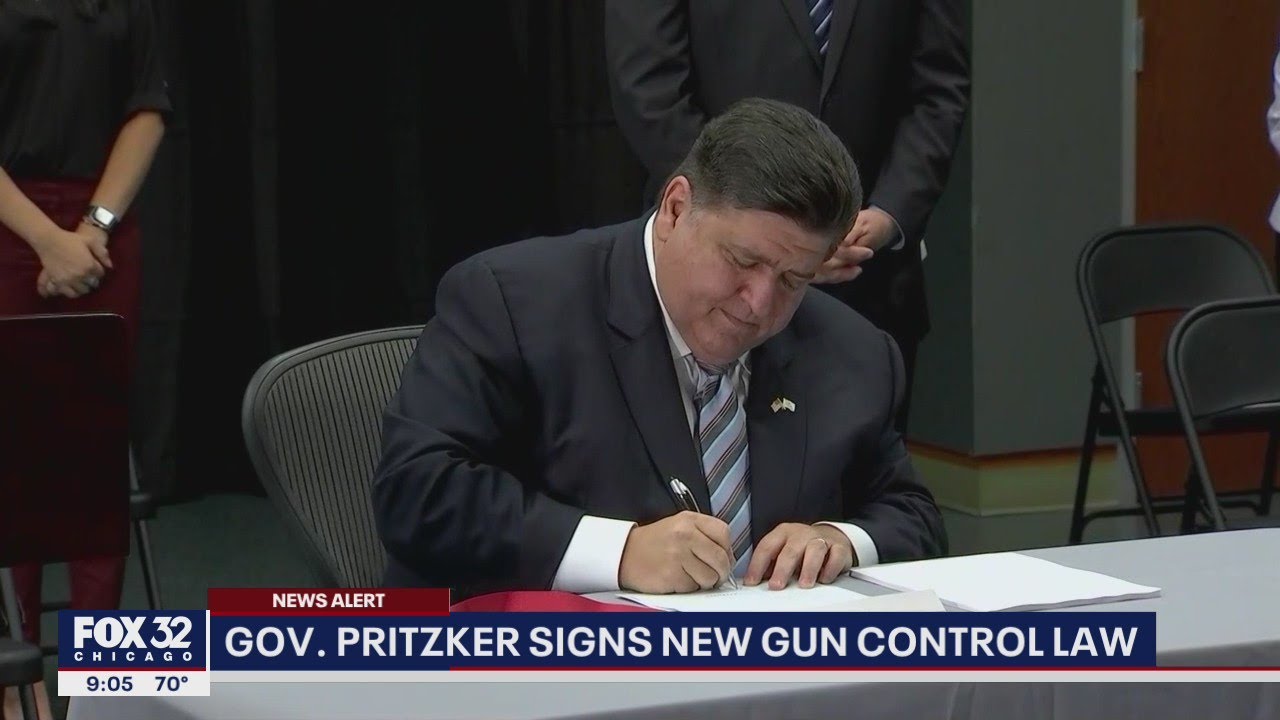 Illinois Gov. JB Pritzker signs new gun control law - YouTube