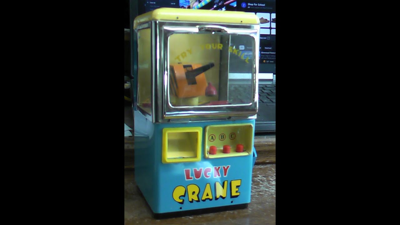 Lucky Crane arcade game. A toy that is meant to be played with. 6 ...