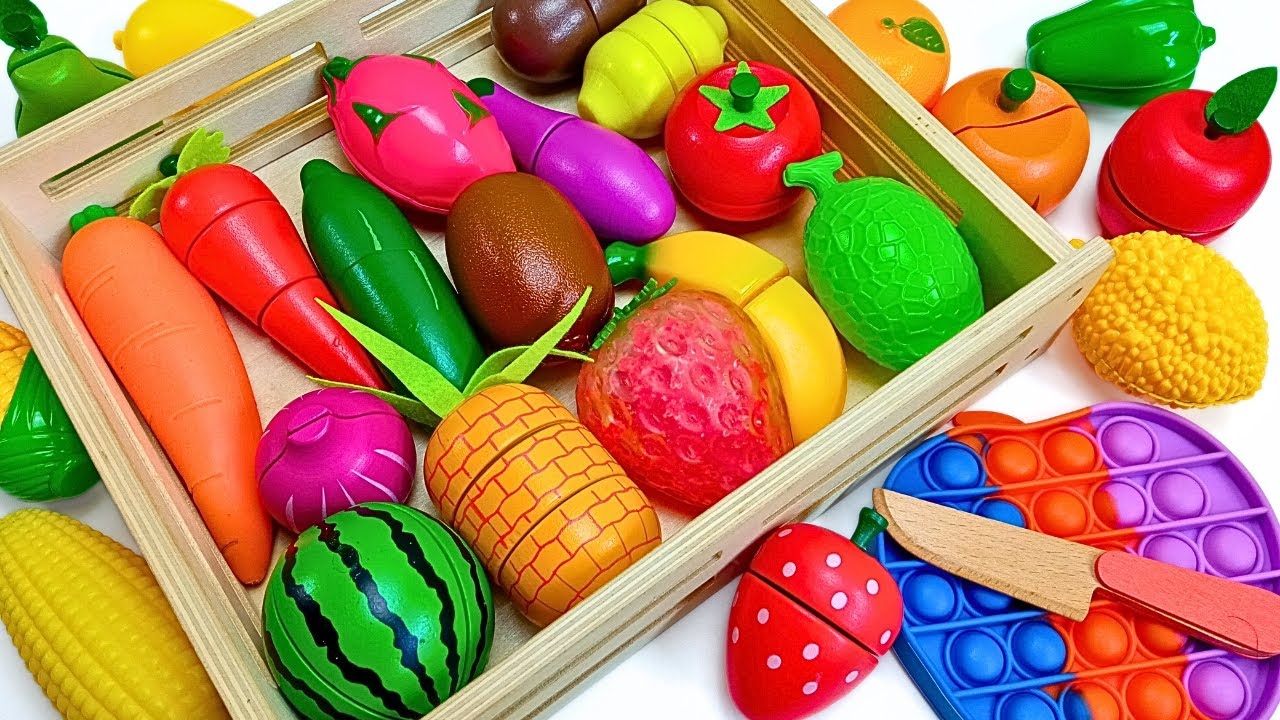 Mixing Fruits and Vegetables Colorful, Cutting Red Strawberry ...