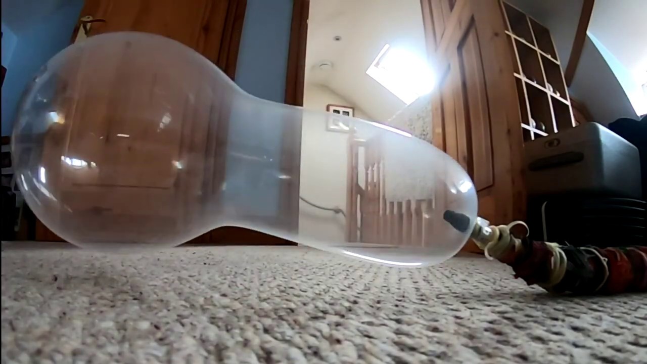 balloons go BANG in slow motion - YouTube