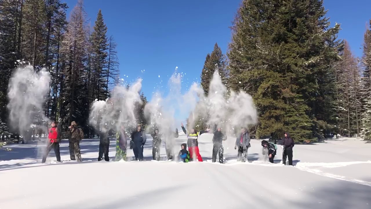 Snowshoeing - Tossing snow up in the air in slow motion - YouTube