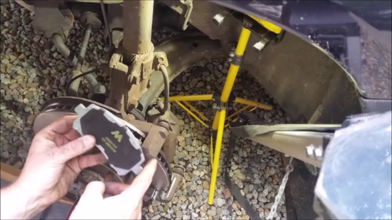 How To Replace Front Pads And Rotors On A Subaru - YouTube