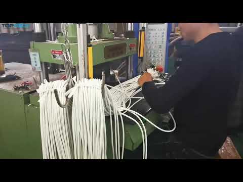 Plugs with handle injection molded on standard vertical injection ...