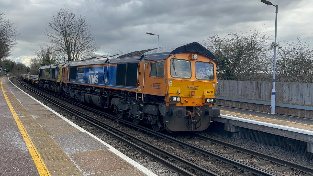 Class 66s 731 (GBRF) 585 (FLiner) Double head with an 8 tone horn ...