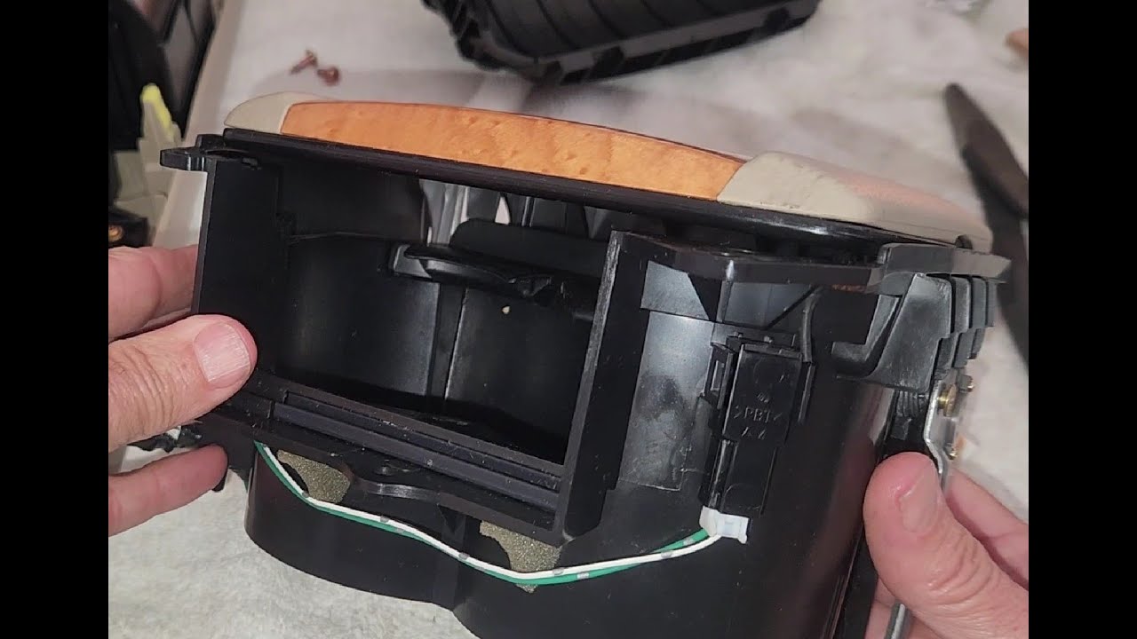 Lexus rx330 center console assembly and cuphold door repair - YouTube