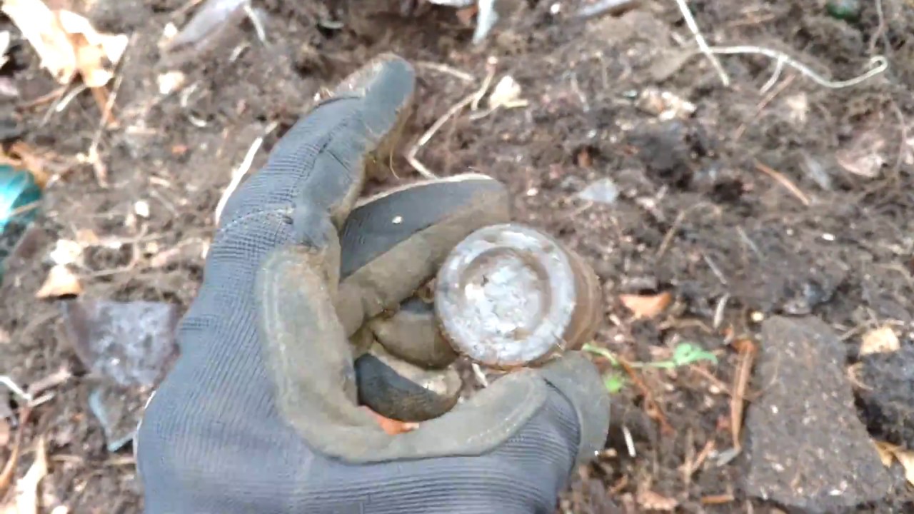 Digging a bottle dump next to a 1790s cellar hole. - YouTube