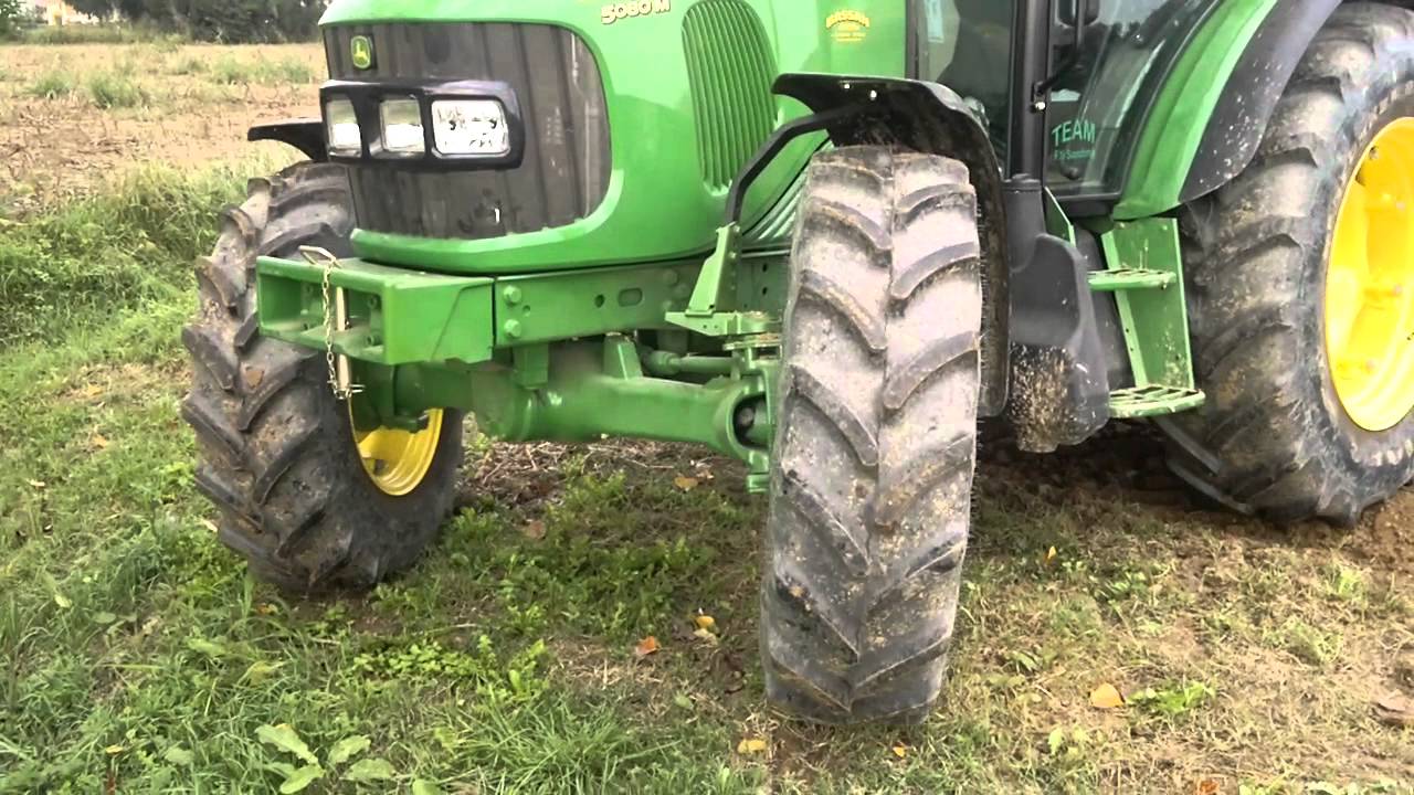 john deere 5080m in preparazione terreno - YouTube