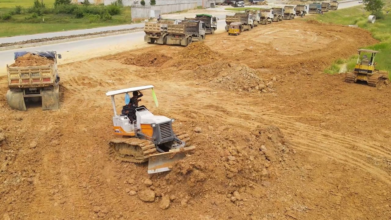 Amazing Mini Bulldozer Pushing soil unloading working with Dump Trucks ...