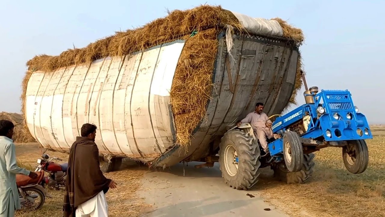 Dangerous Tractors stunts Ford Tractor - YouTube