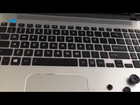 Un boxing and review of the T186 button camera - YouTube