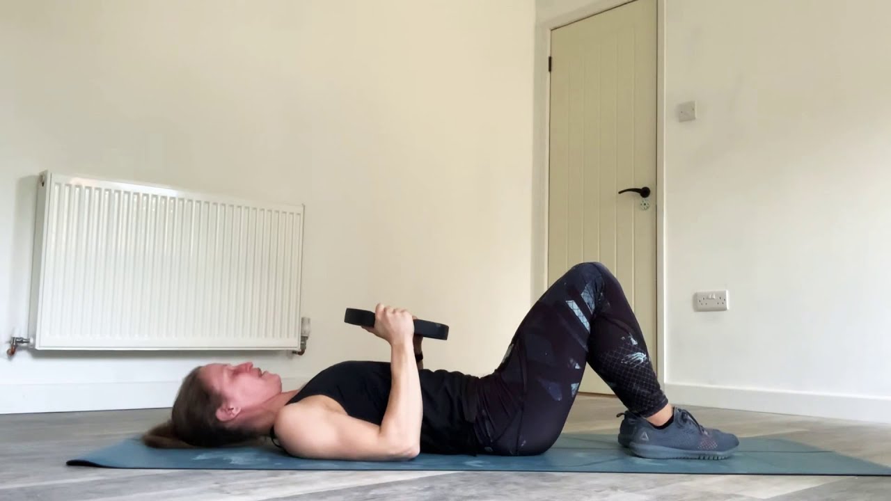 Weighted Plate Crunch with Overhead Extension - At Home - Energy ...