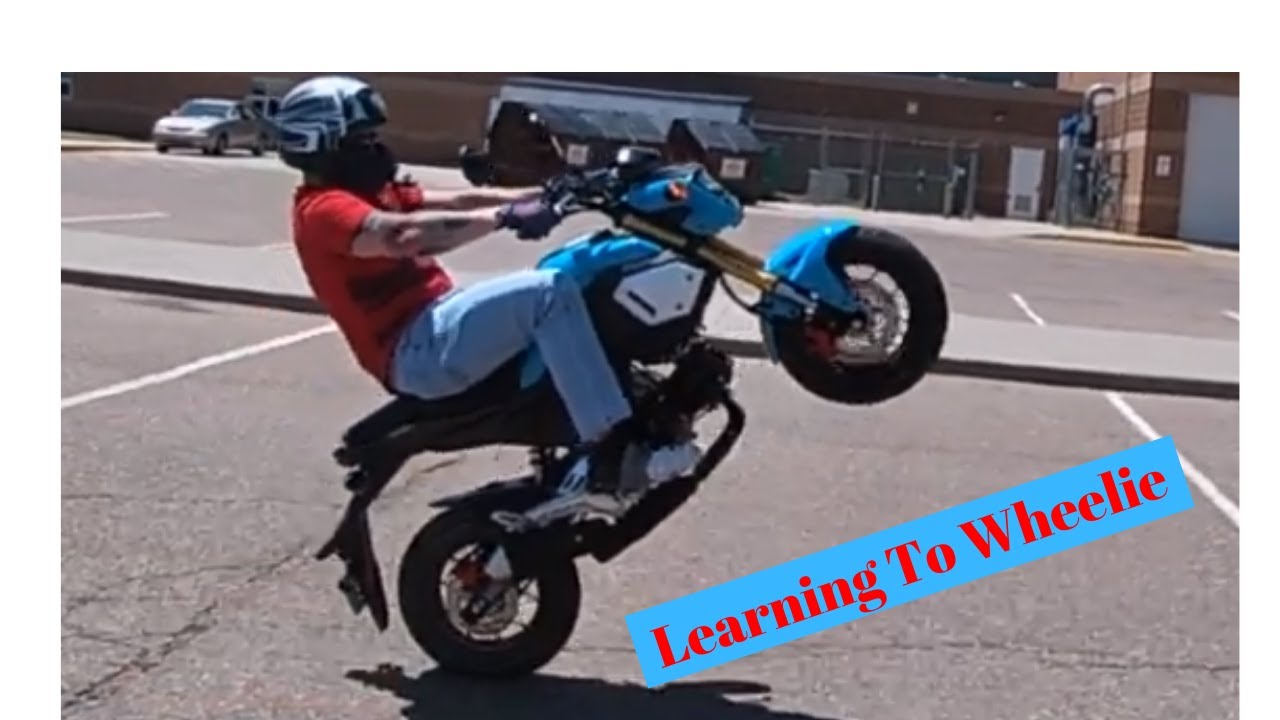 learning How to Wheelie My Stock 2019 Honda Grom - YouTube
