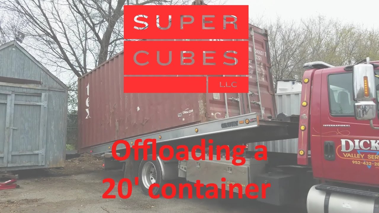 Offloading a 20' container - YouTube