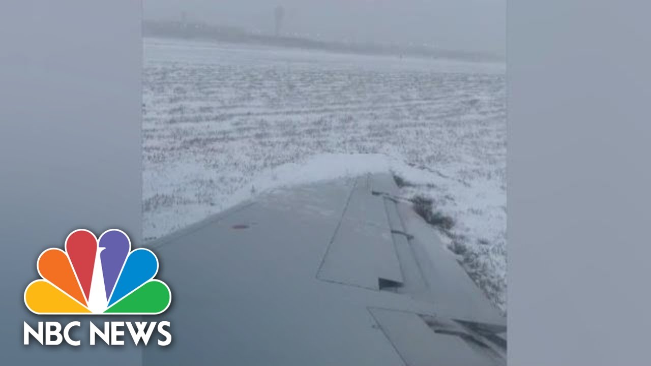 American Airlines Flight Slides On Icy O’Hare Runway | NBC News - YouTube