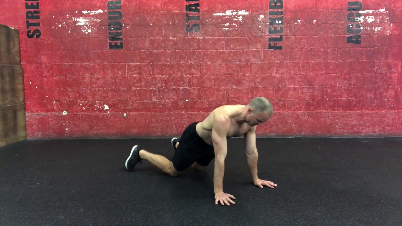Kneeling pushup plus alternating reach - YouTube