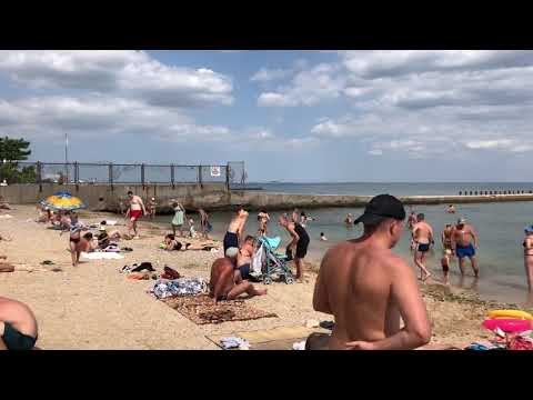 Russian beach! Crimea, Feodosia. Black sea. Popular central city beach.